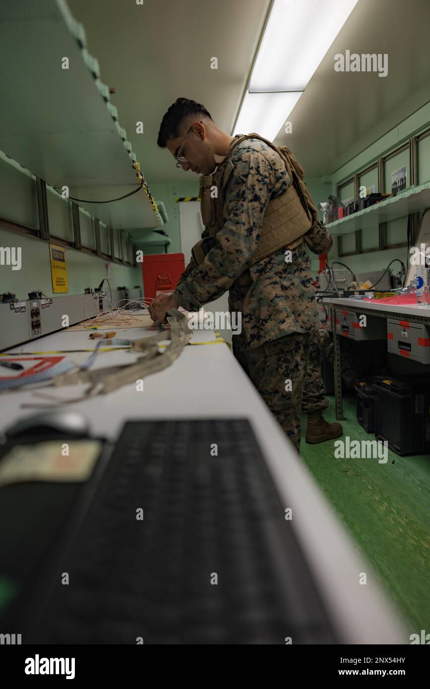 U.S. Marine Corps Cpl. Brandon Aguiniga, an aviation electronic ...