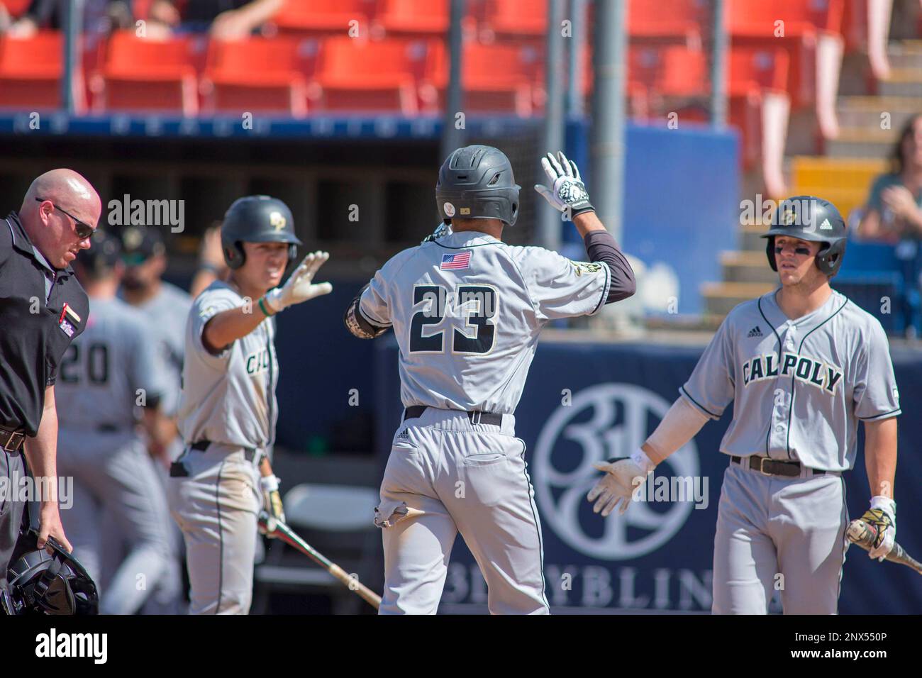Cal Poly San Luis Obispo Mustangs Alex McKenna (23) is greeted at home ...