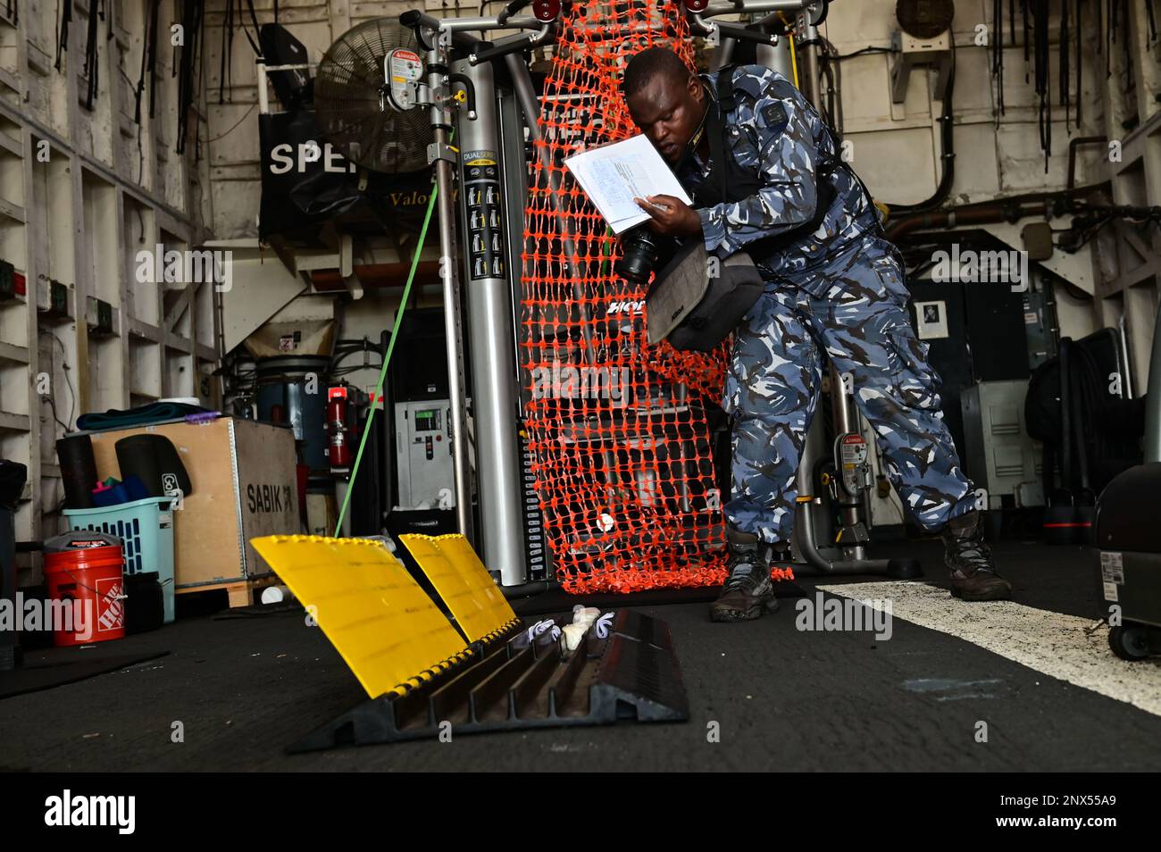 A Benin Navy sailor conducts law enforcement training aboard USCGC ...