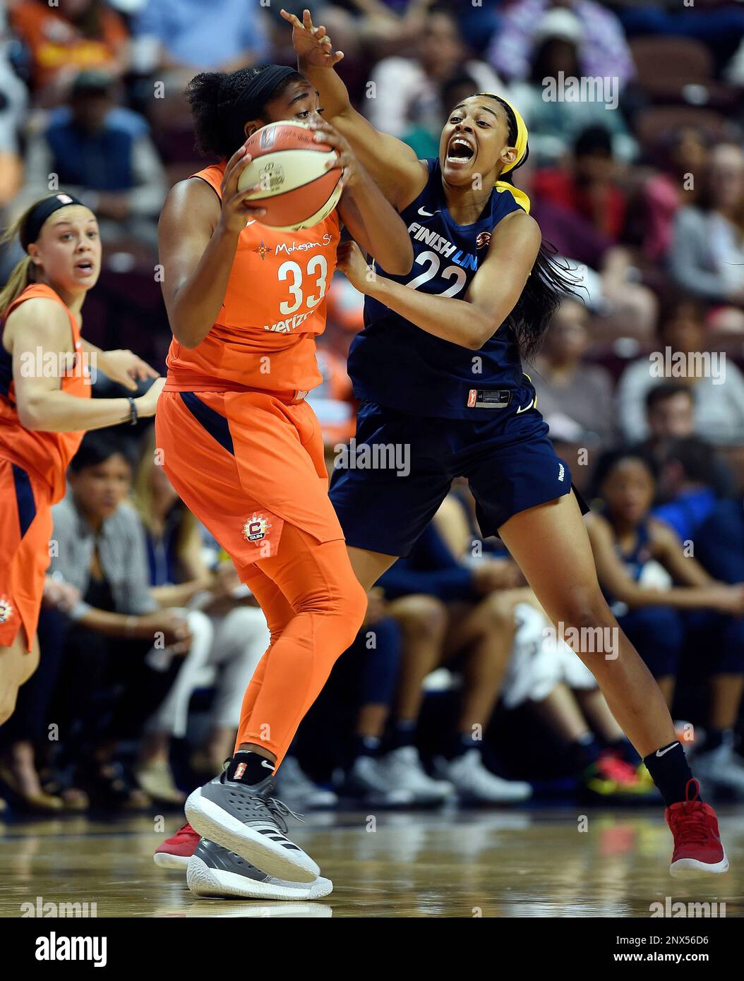 Indiana Fever forward Erica McCall (22) pressures Connecticut Sun ...