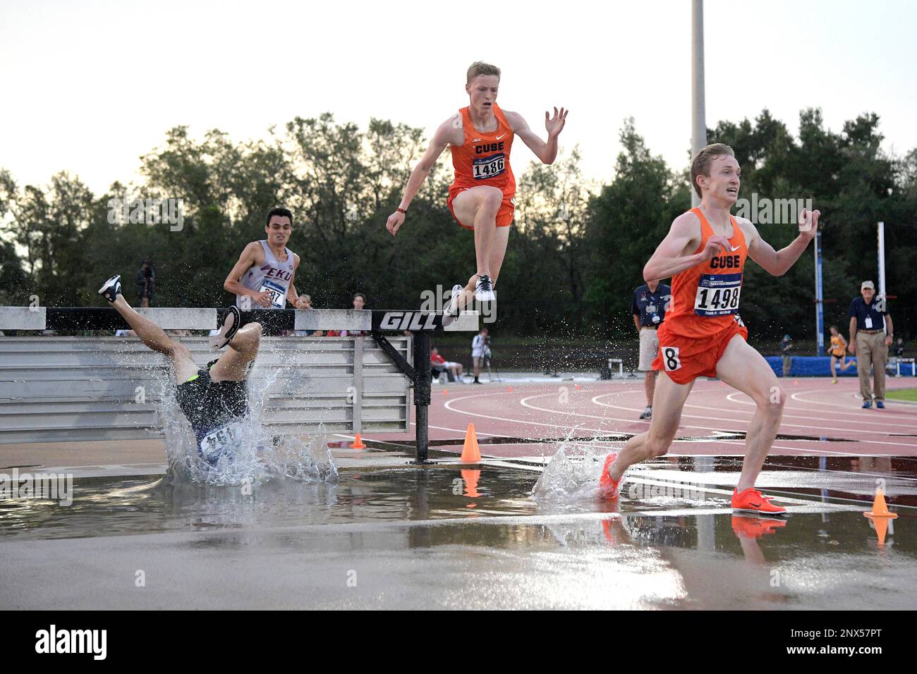 Furman's Troy Redder (494) flips into the water after missing a hurdle ...