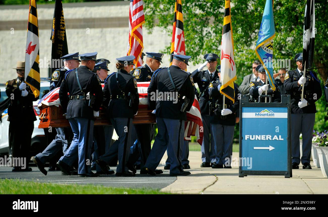 Pallbearers carry the coffin of Officer Amy Caprio during her funeral ...