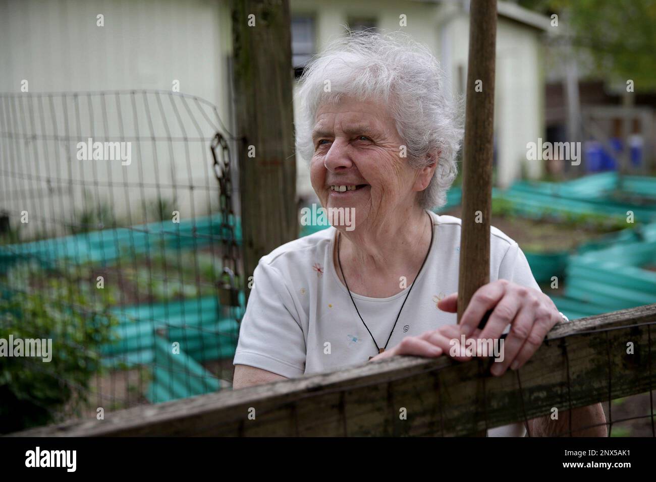 Sister Margaret McKenna rests next to her garden at the New Jerusalem ...