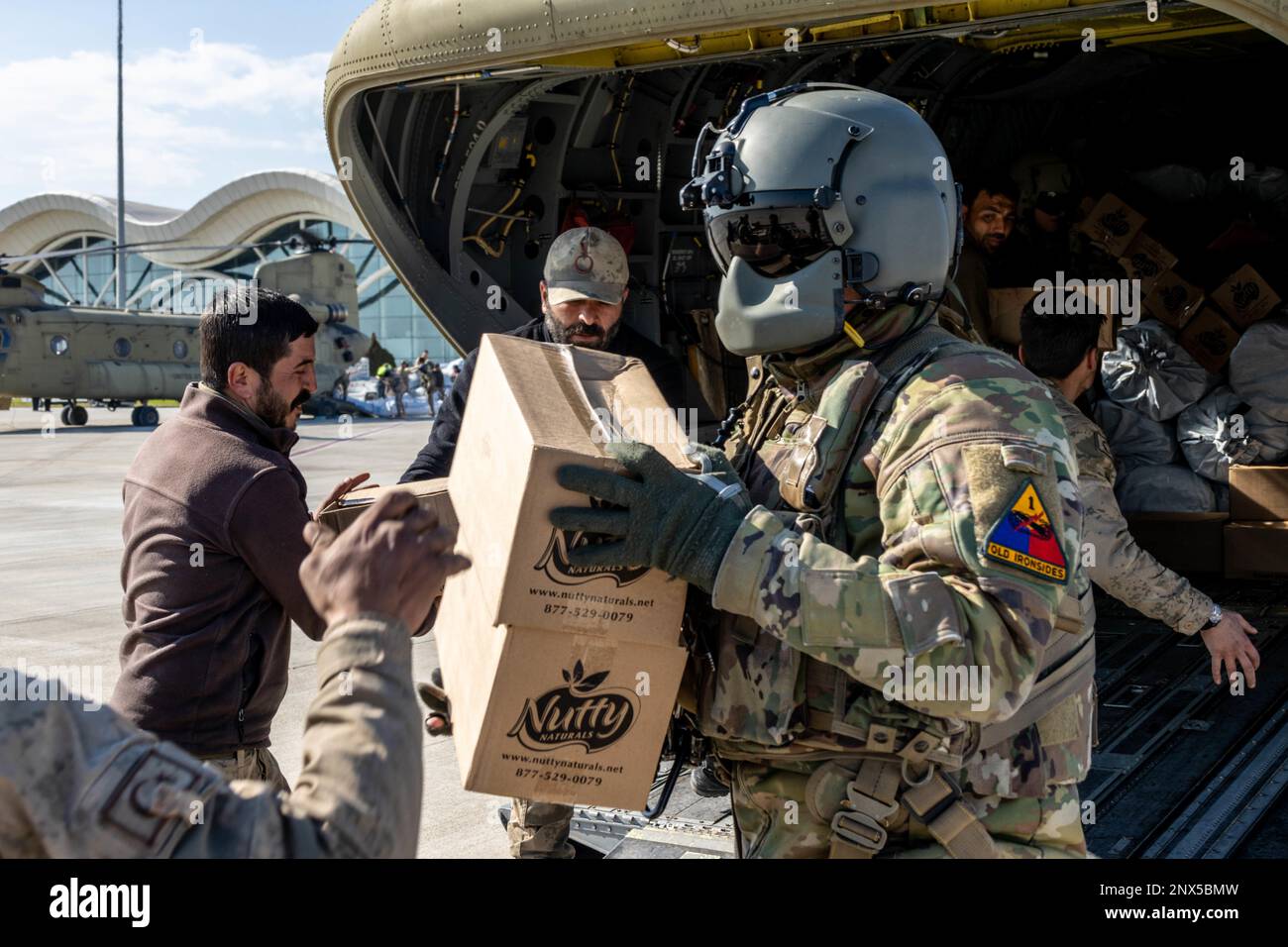 U.S. Army 1st Sgt. Christopher Norris, a CH-47F Chinook crew chief ...