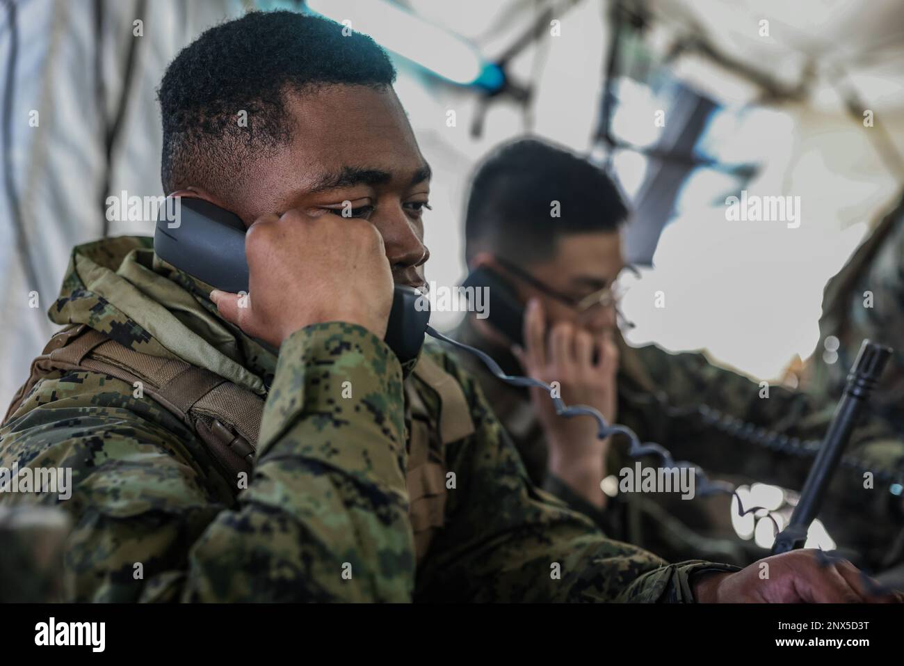 U.S. Marine Corps Lance Cpl. Ollis Solrain and Lance Cpl. Edmund Zhu ...