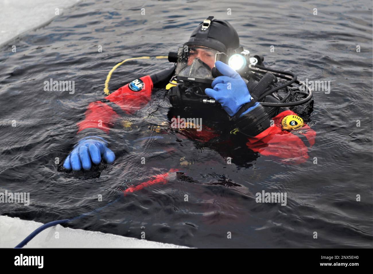 A firefighter with the Directorate of Emergency Services Fire ...