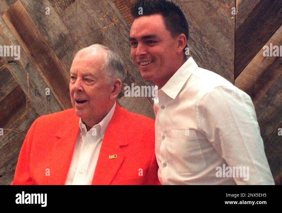 T. Boone Pickens, left, and former Oklahoma State golfer Rickie Fowler ...