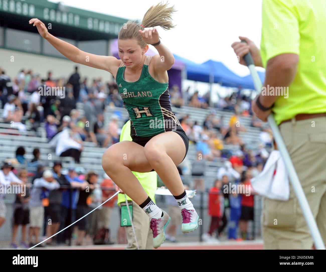 Highland's Maison Tolle launches herself in the girls 2A long jump ...