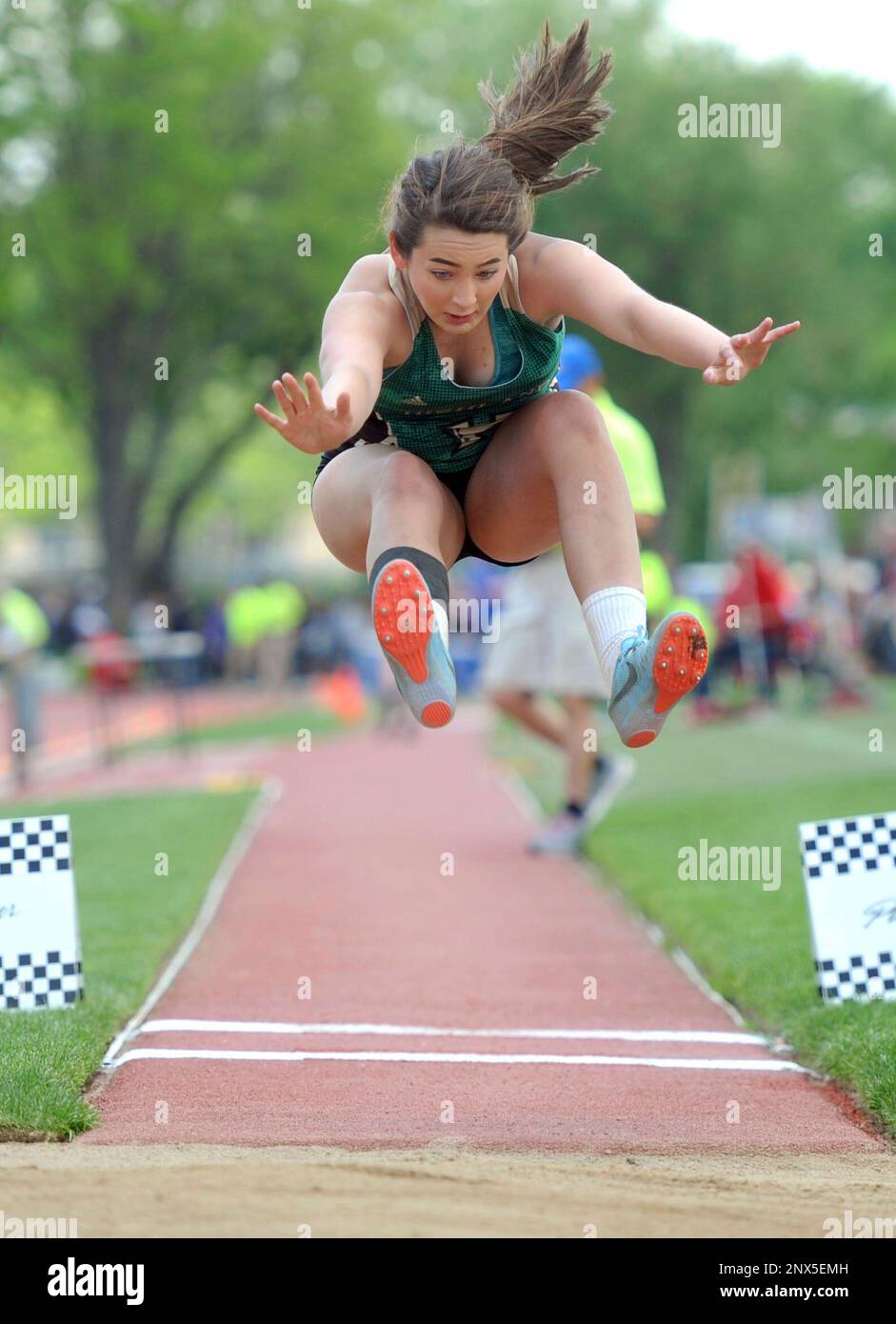 Highland's Sierra Staab jumps in the 2A girls long jump on Friday in ...