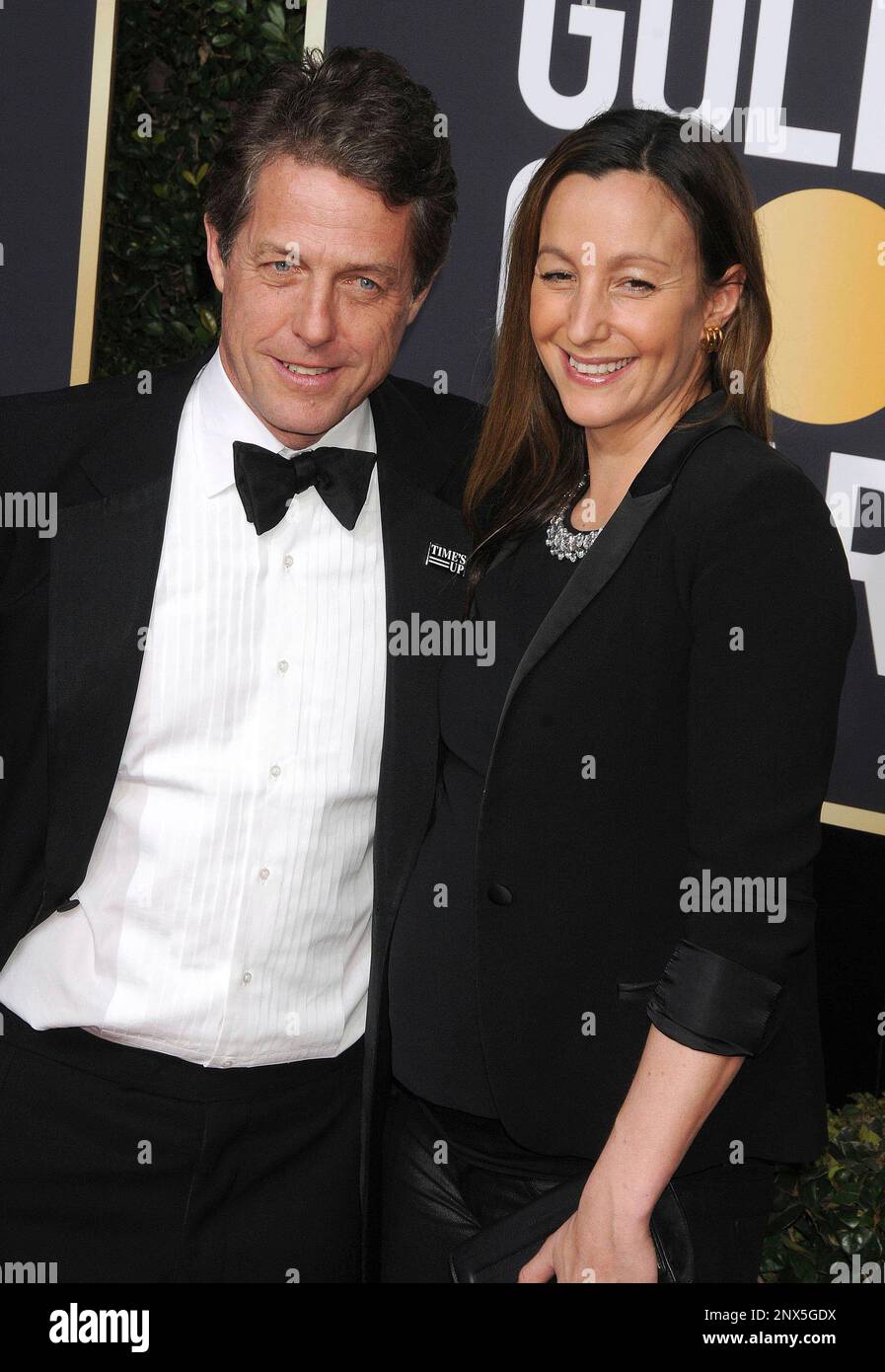 File Photo by: Galaxy/STAR MAX/IPx 2018 1/7/18 Hugh Grant and Anna Eberstein at the 75th Annual ...