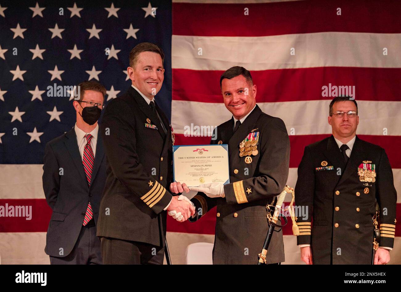 Rear Adm. Mark Sucato, right, commander, Navy Region Northwest ...