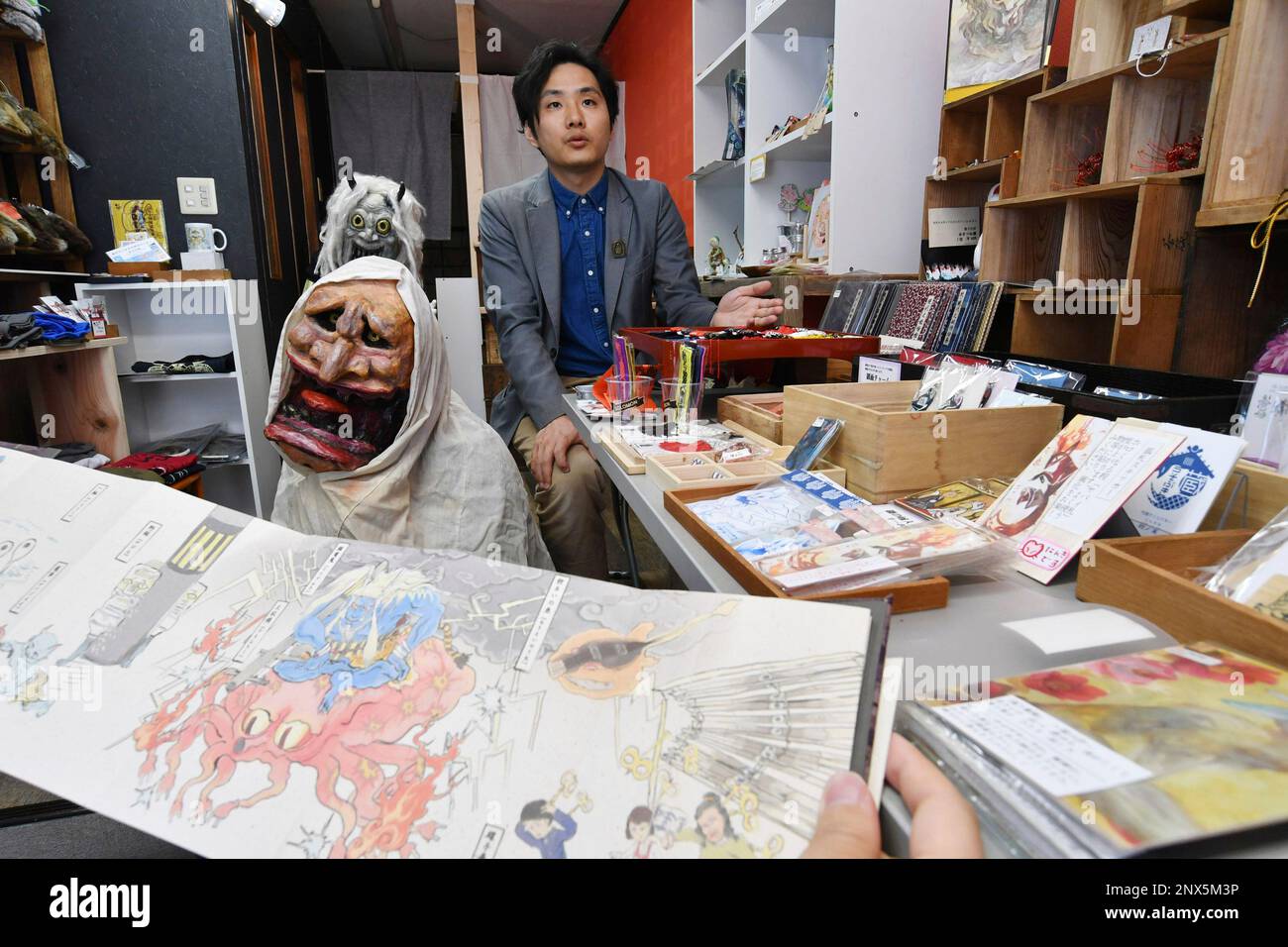 A picture taken on April 28, 2018 shows some Yokai monster products at ...