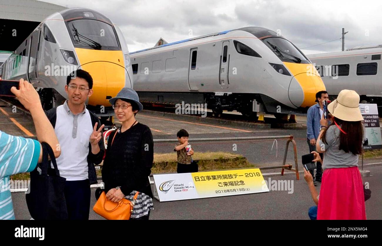 Visitors take photo with Class 800 at Hitachi's Kasado Works in ...