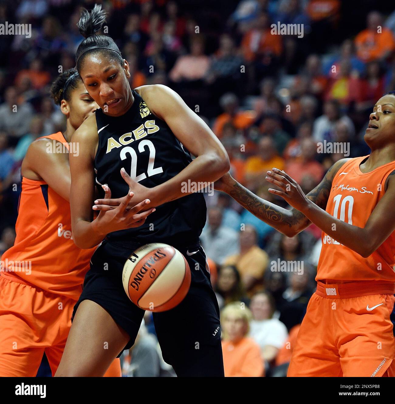 Las Vegas Aces forward A'ja Wilson (22) battles Connecticut Sun forward ...