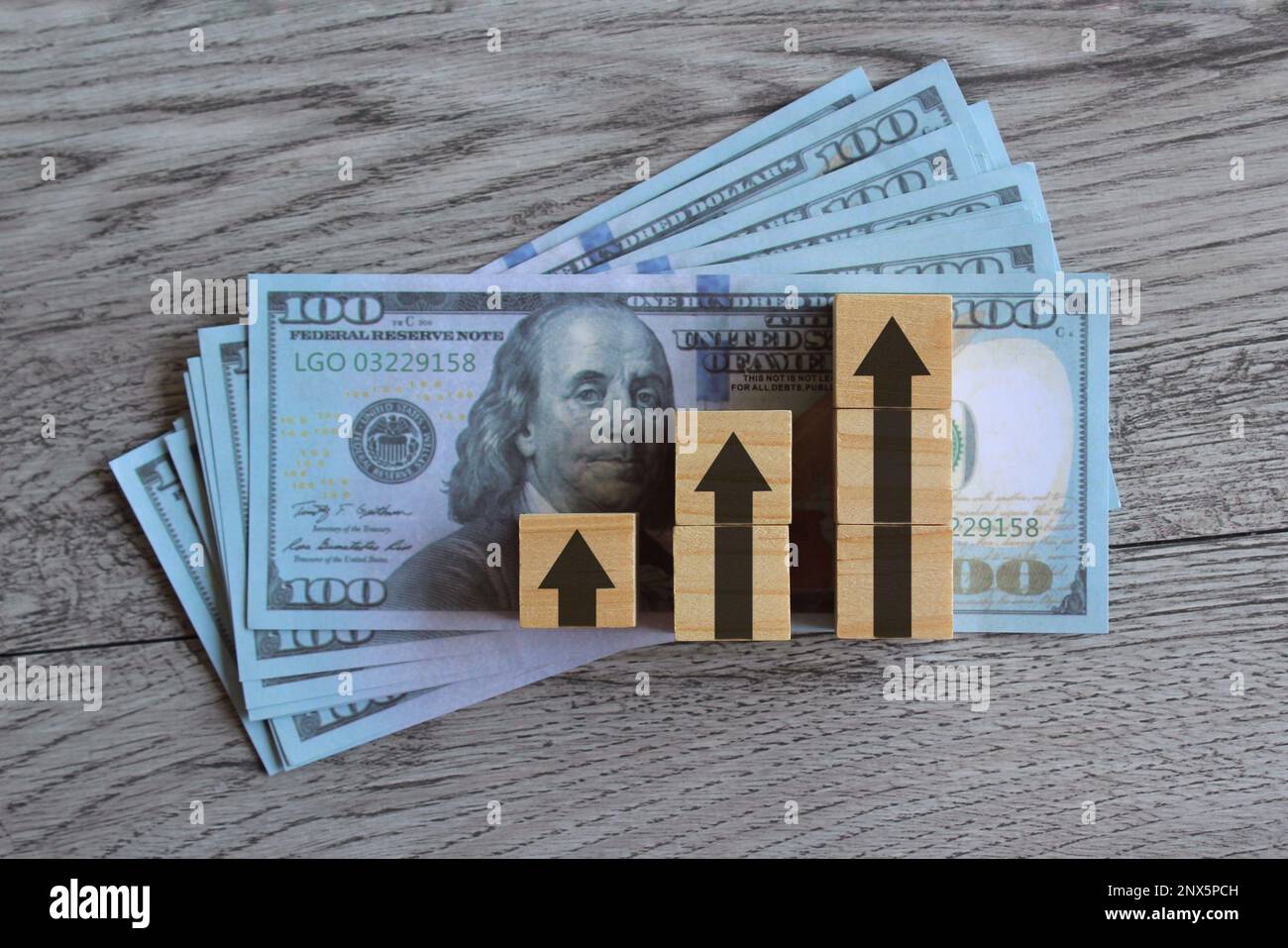 Top view image of money and upward arrows. Business, profit increase ...