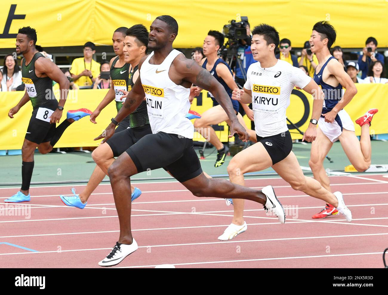 American sprinter Justin Gatlin(C) competes during men's 100 meters of ...