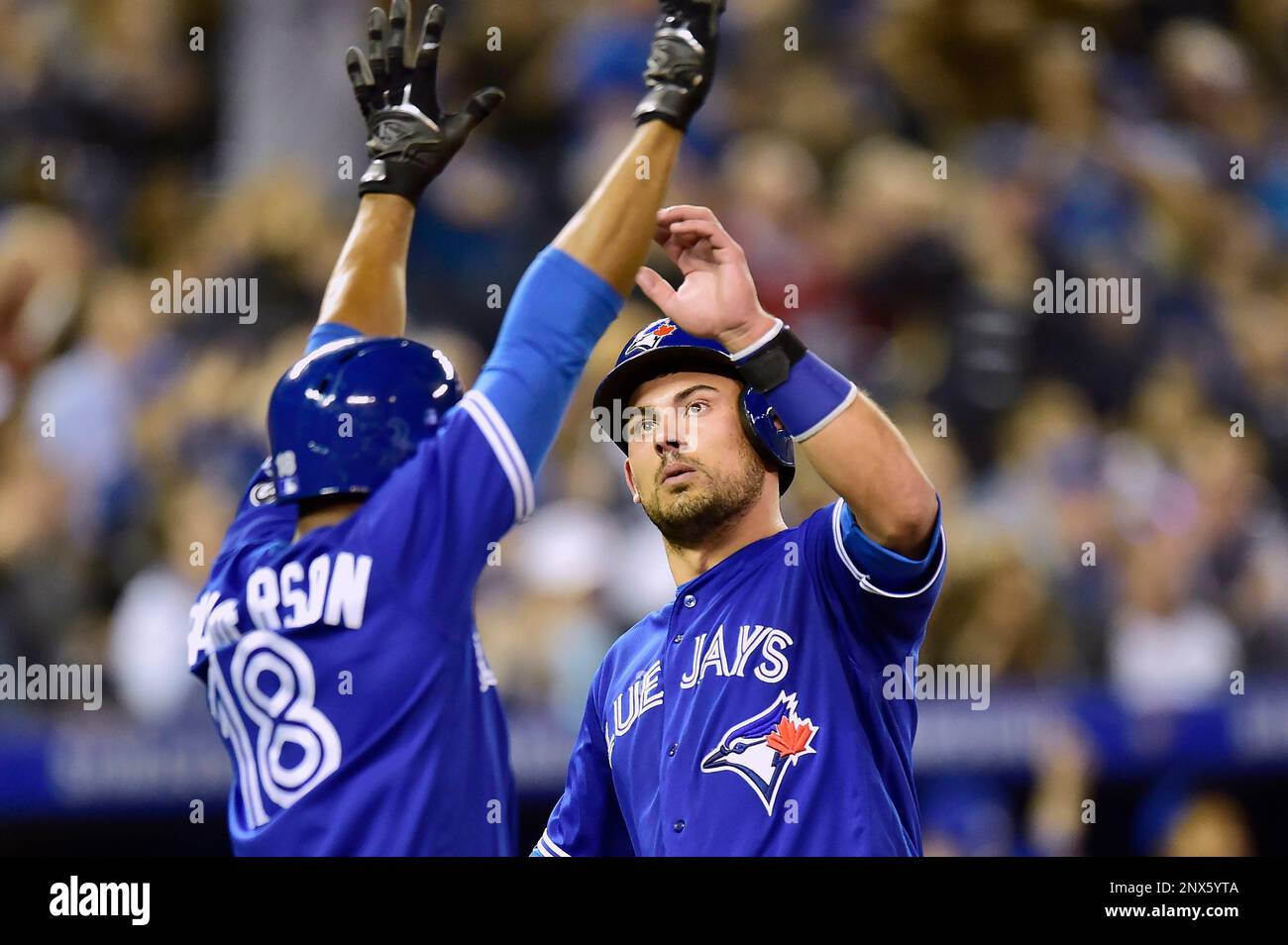 Toronto Blue Jays' Curtis Granderson, left, congratulates Luke Maile ...