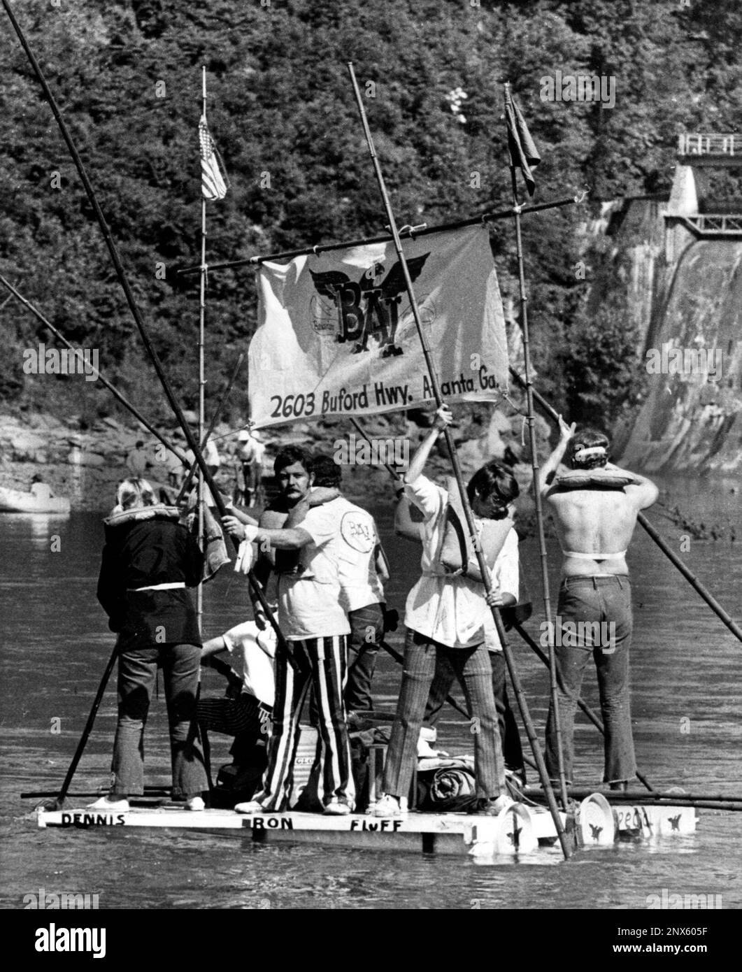 Participants in the Chattahoochee Raft Race pole their raft through ...