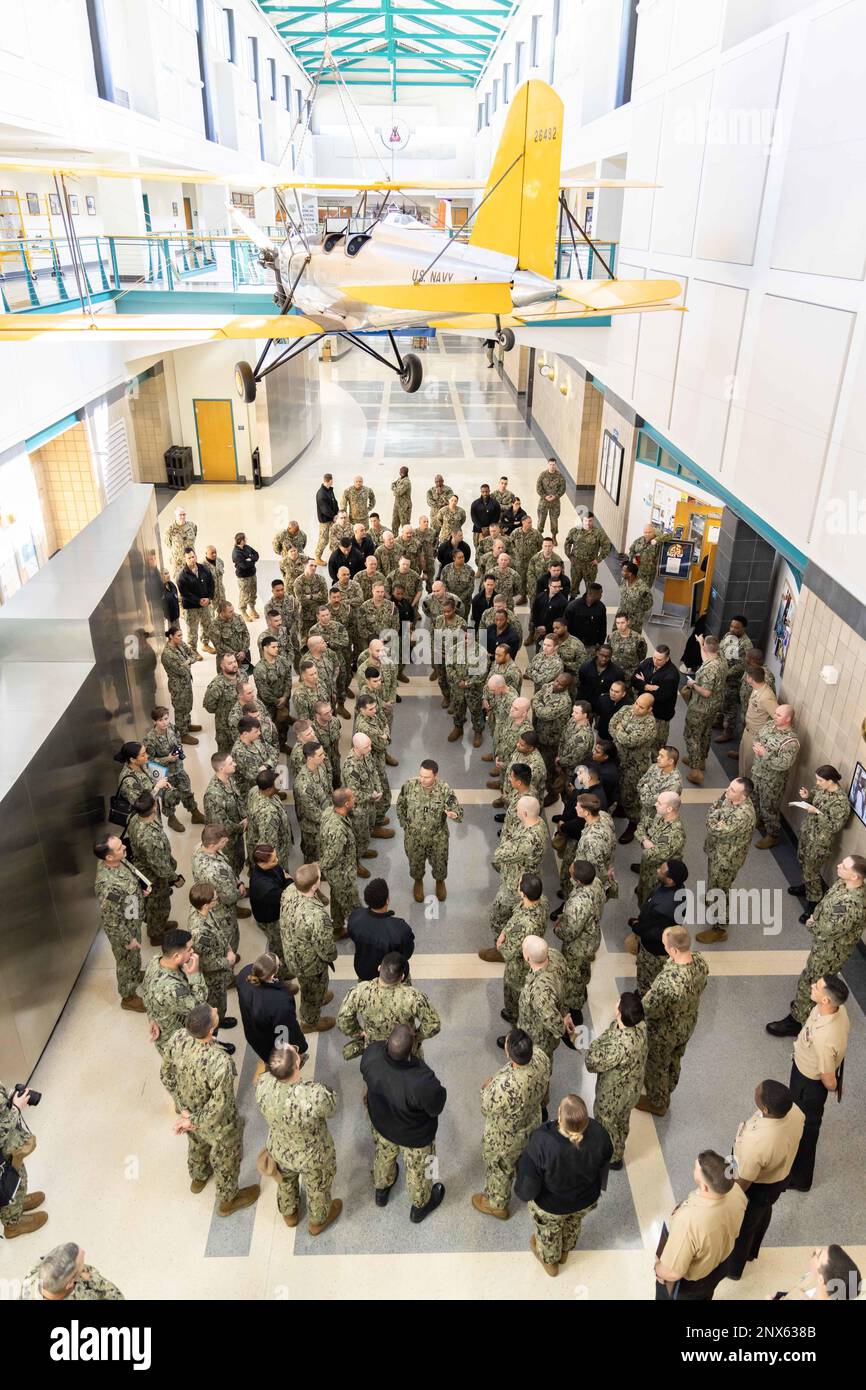 Chief of Naval Personnel Vice Adm. Rick Cheeseman, center, speaks with ...