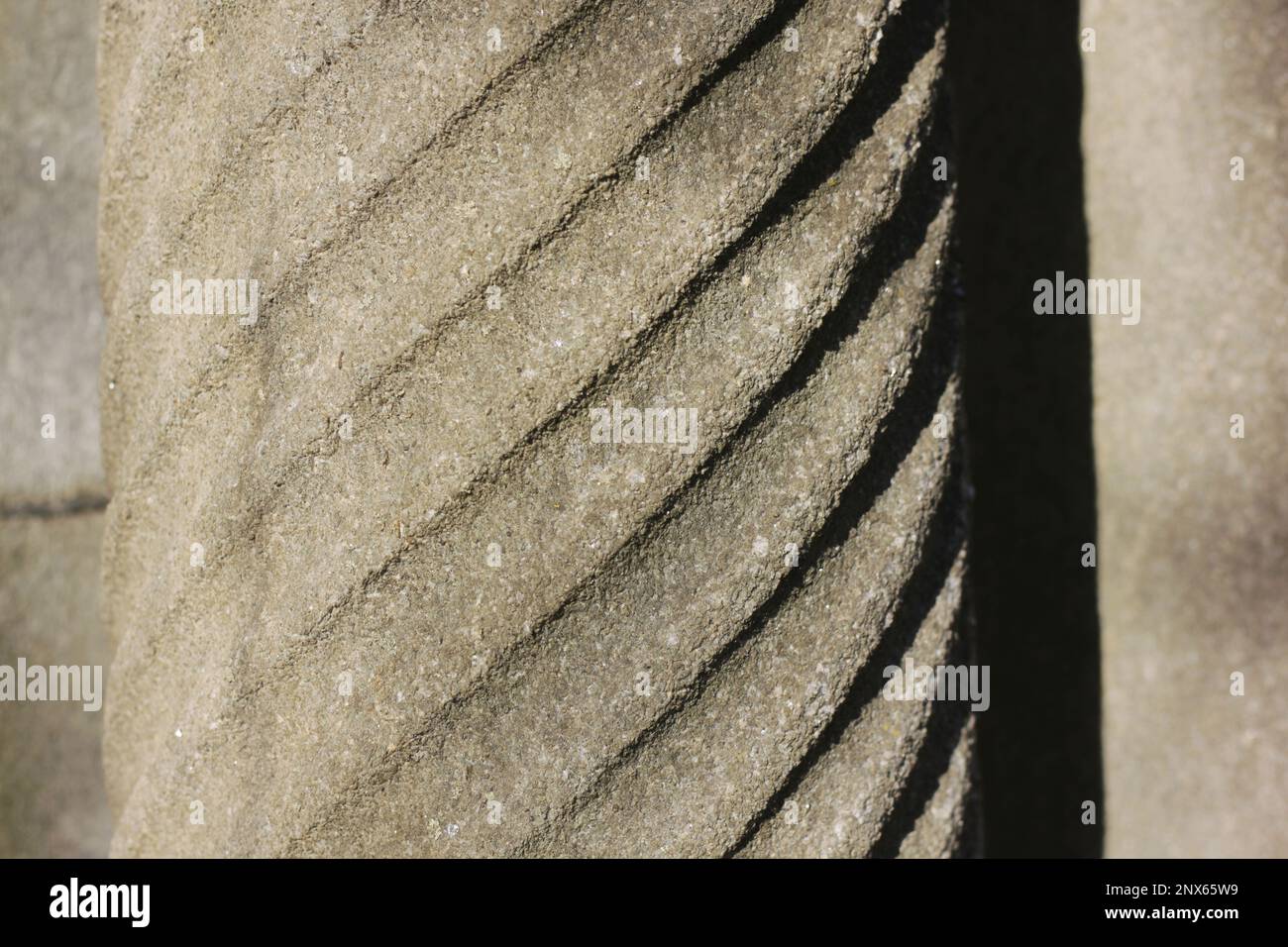 A closeup view of a fluted column carved in natural stone Stock Photo ...