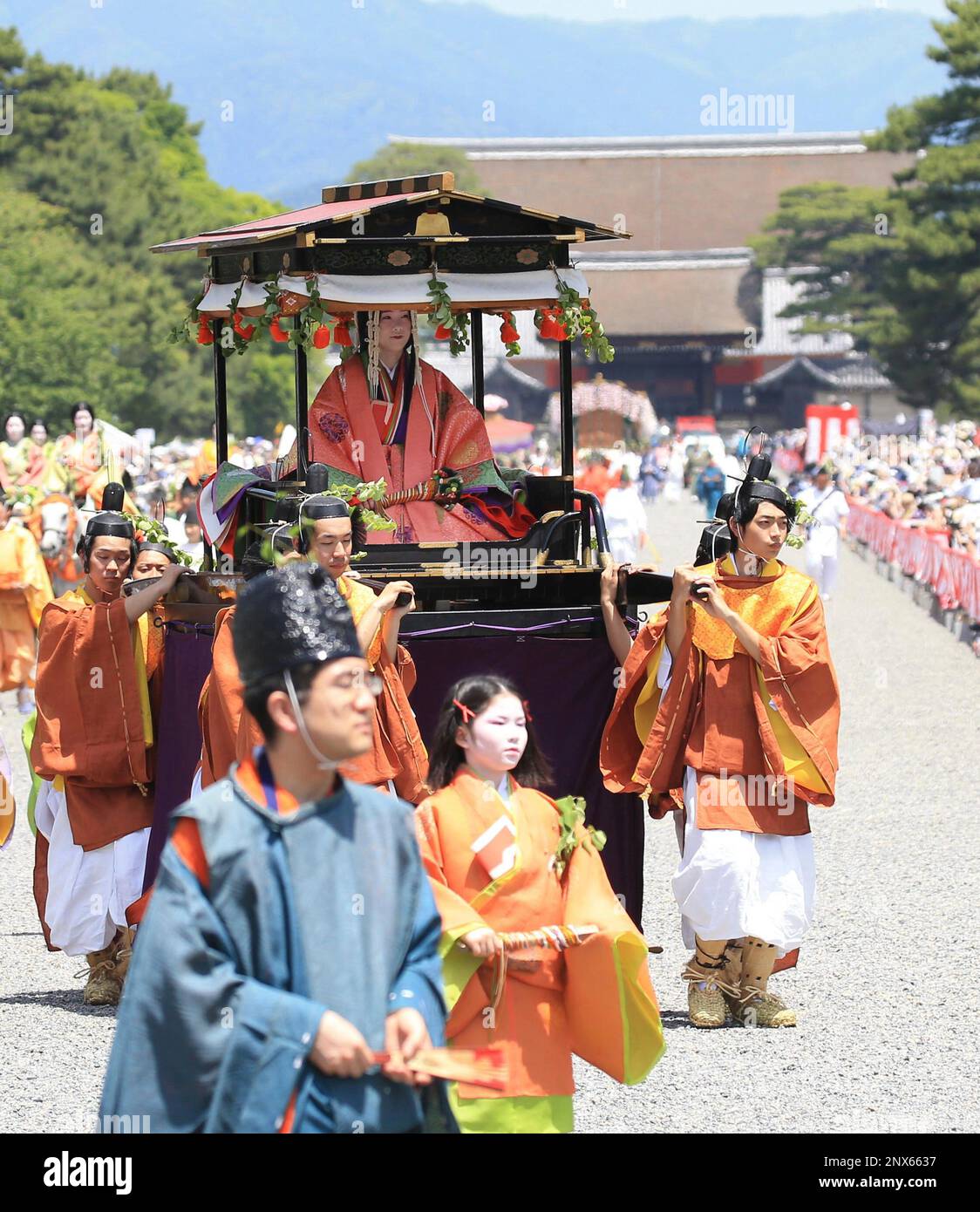 Shiho Sakashita (C) the queen "Saiodai", dressed in traditional multi ...