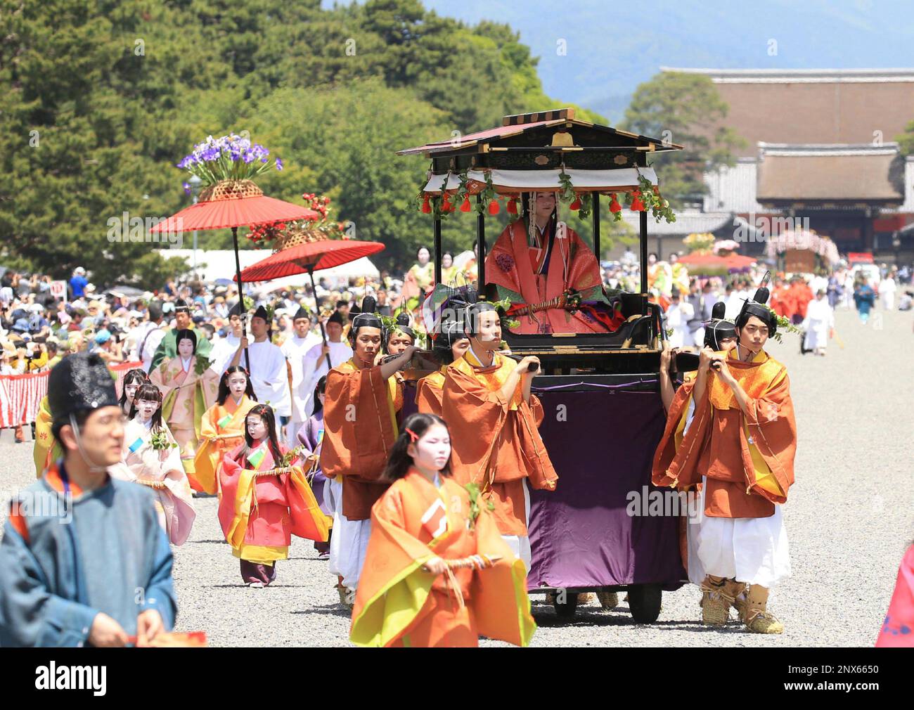 Shiho Sakashita (Center R) the queen "Saiodai", dressed in traditional ...
