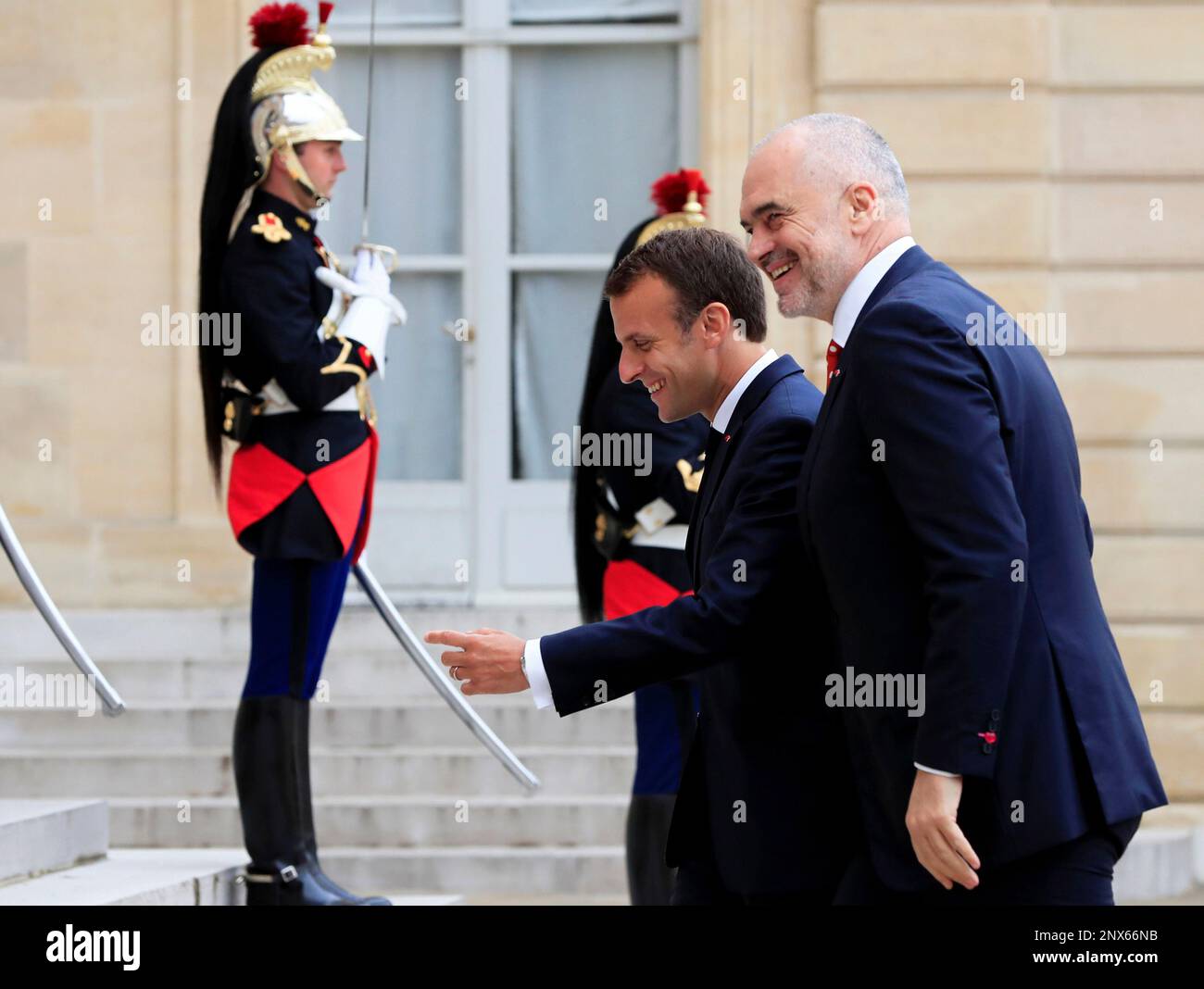 French President Emmanuel Macron, left, welcomes Albanian Prime ...