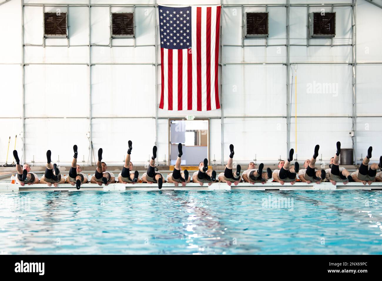 Special Warfare candidates complete team challenges in the pool while ...
