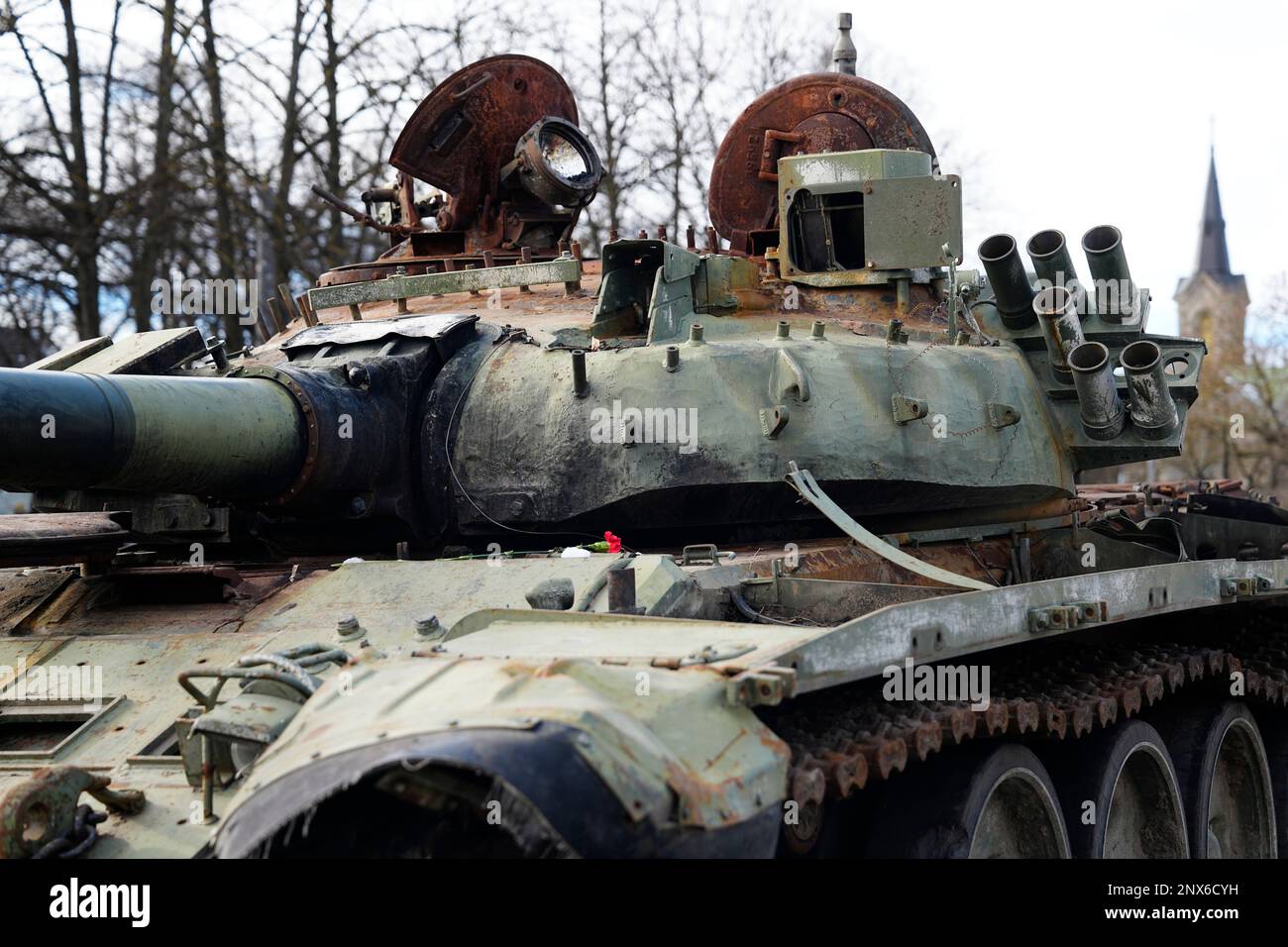 A flower is placed on a destroyed Russian T-72B3 tank installed as a ...