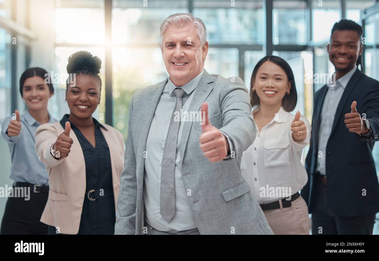 Business people, portrait and thumbs up for winning, agreement or corporate team success at the ...