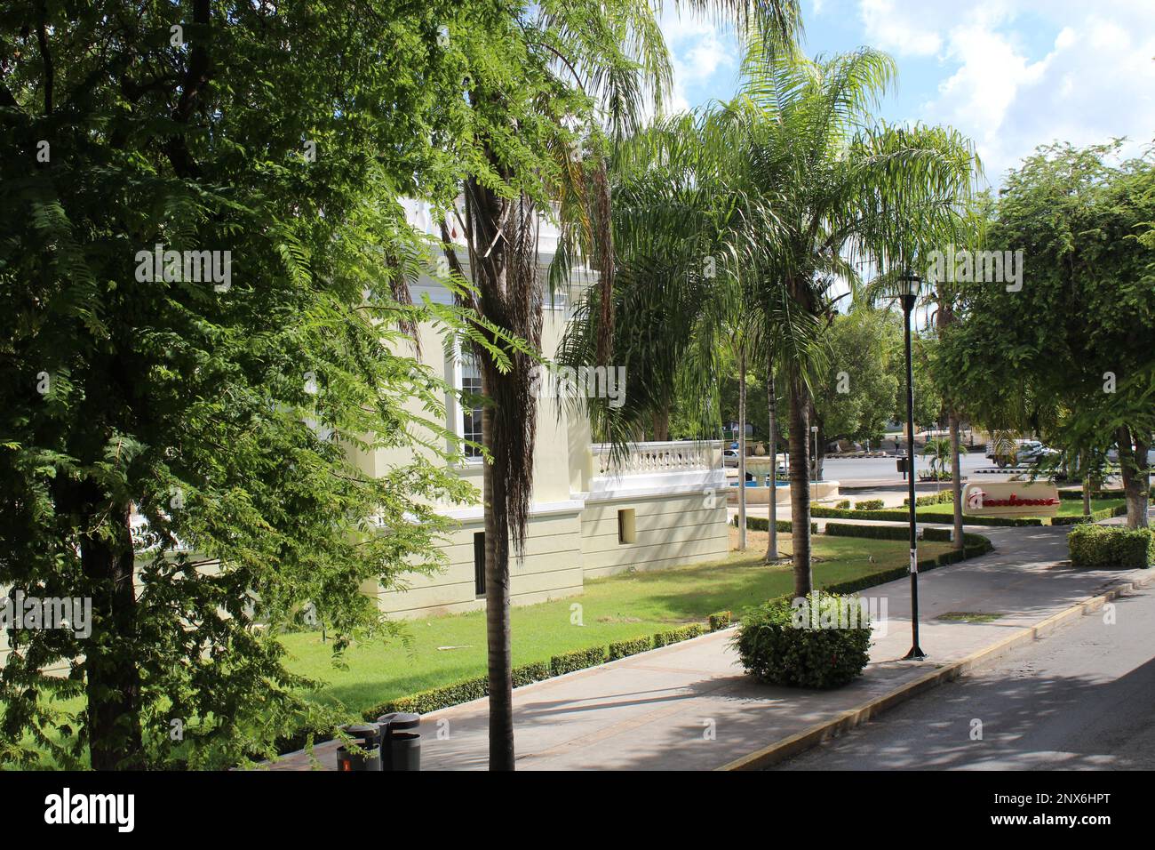 MERIDA, MEXICO - OCTOBER 21, 2016 park with gardens and grass in the ...