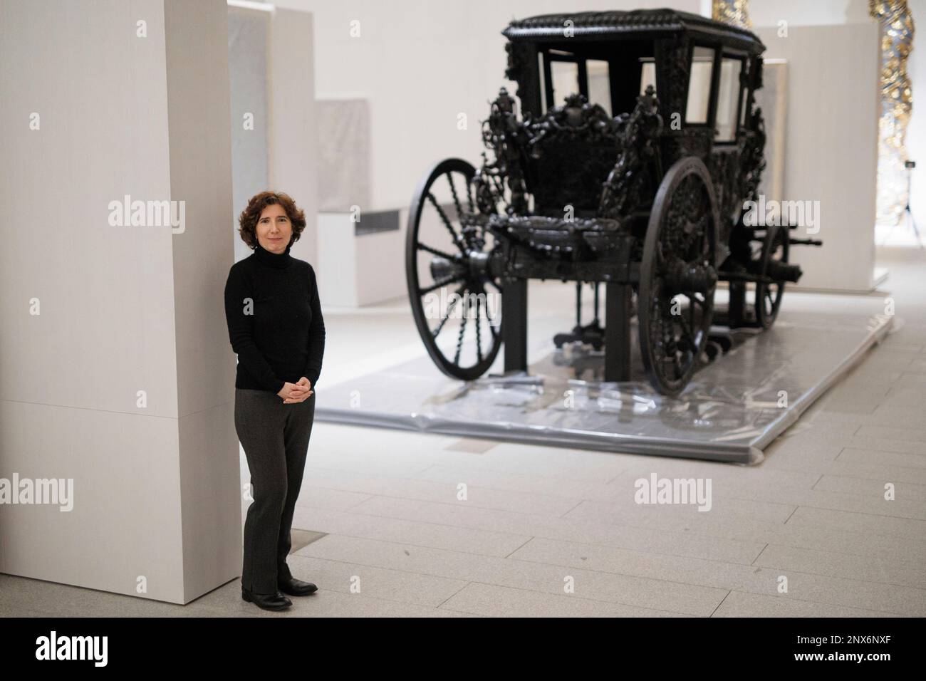 The curator of the Royal Collections Gallery, poses during an interview ...