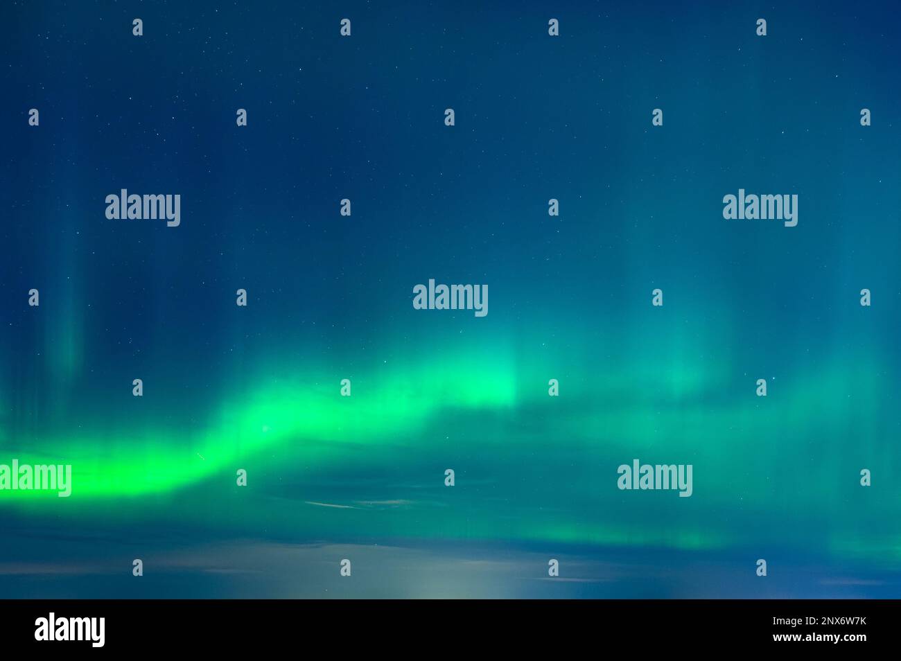 Green Aurora borealis or polar lights on night blue sky Stock Photo - Alamy