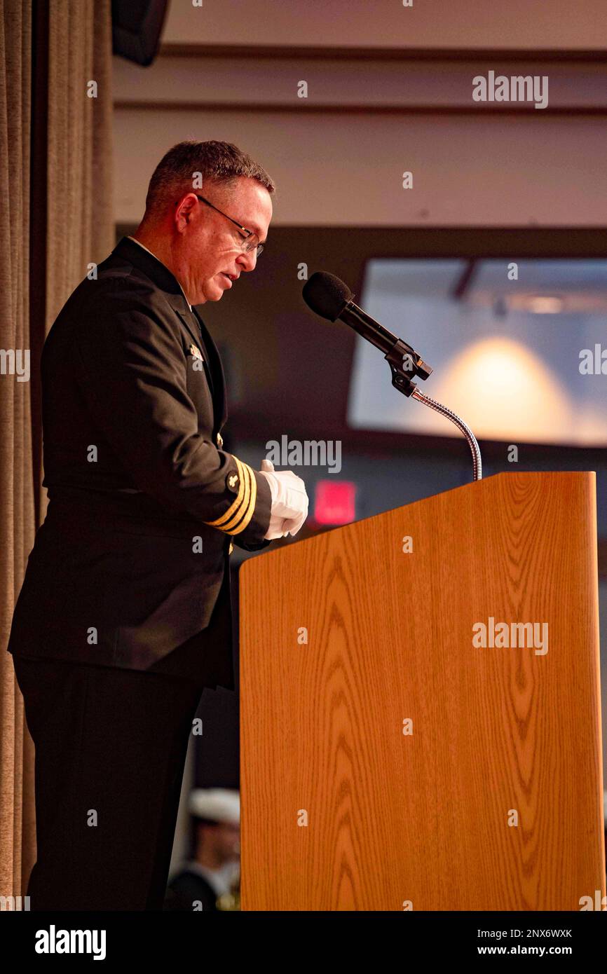 Cmdr. Rob Wills, chaplain, delivers the benediction during a change of ...