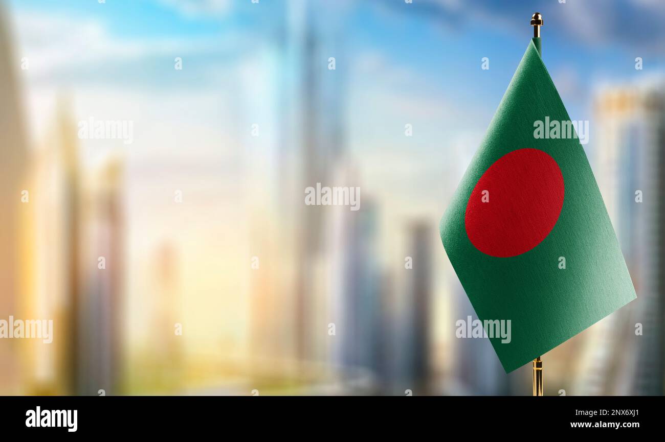 Small flags of the Bangladesh on an abstract blurry background Stock ...