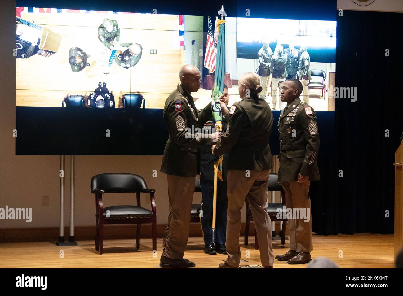The Soldier Support Group command team passes the unit colors to ...