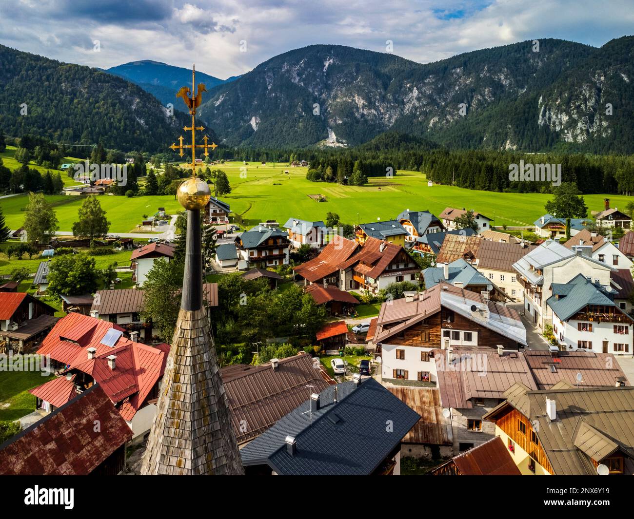 The mountain town of Valbruna and the Julian Alps. Dream nature. Friuli ...