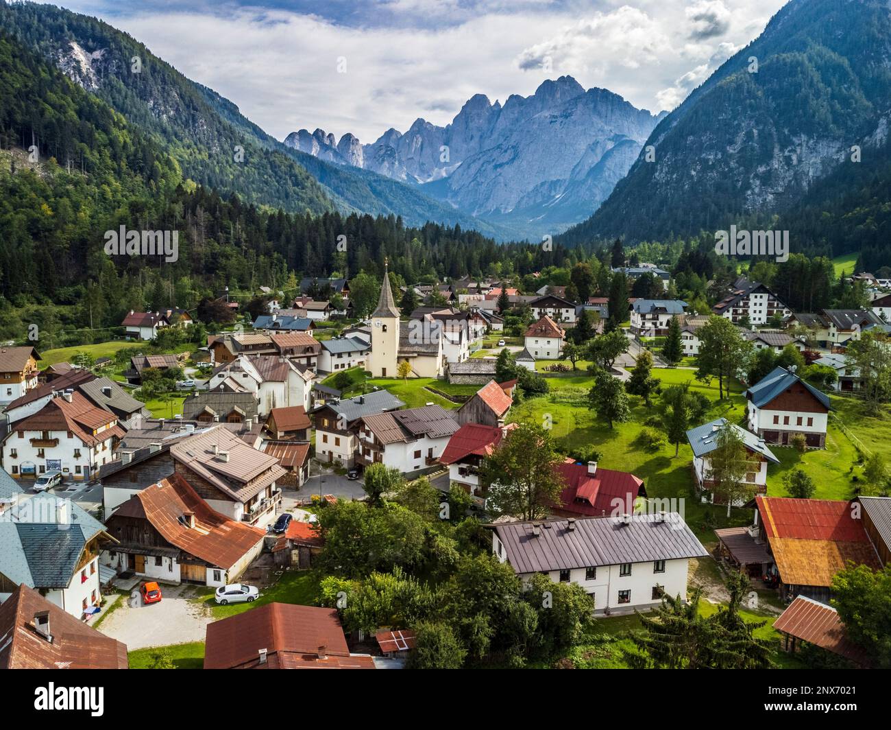 The mountain town of Valbruna and the Julian Alps. Dream nature. Friuli ...