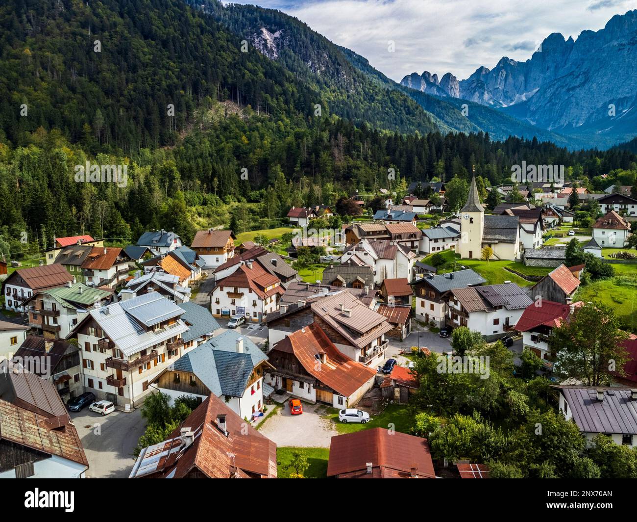 The mountain town of Valbruna and the Julian Alps. Dream nature. Friuli ...