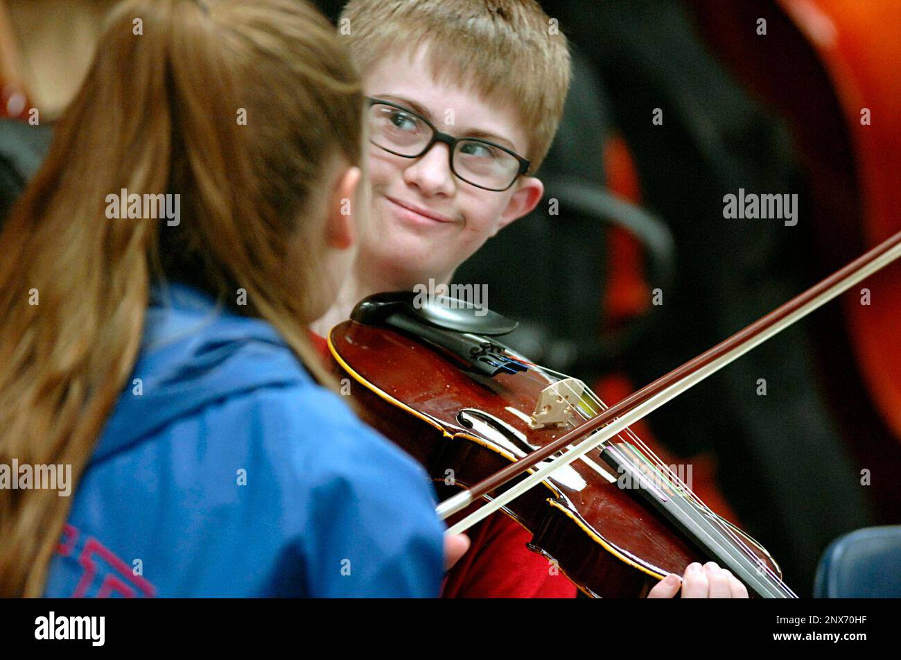 In an April 10, 2018 photo, Carter Conlin glances up at music director ...
