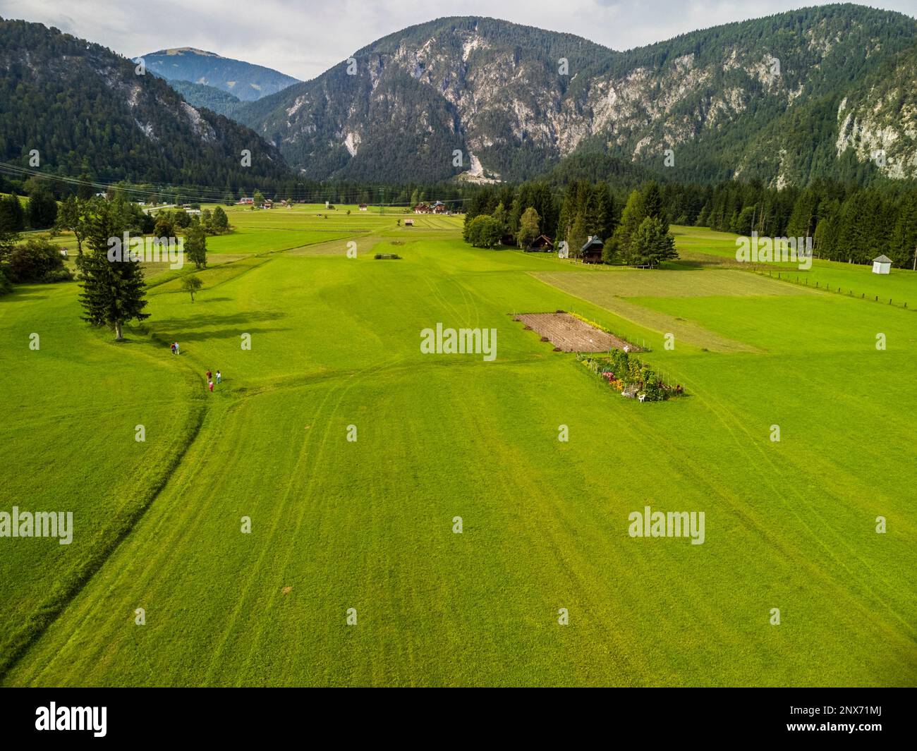 The mountain town of Valbruna and the Julian Alps. Dream nature. Friuli ...