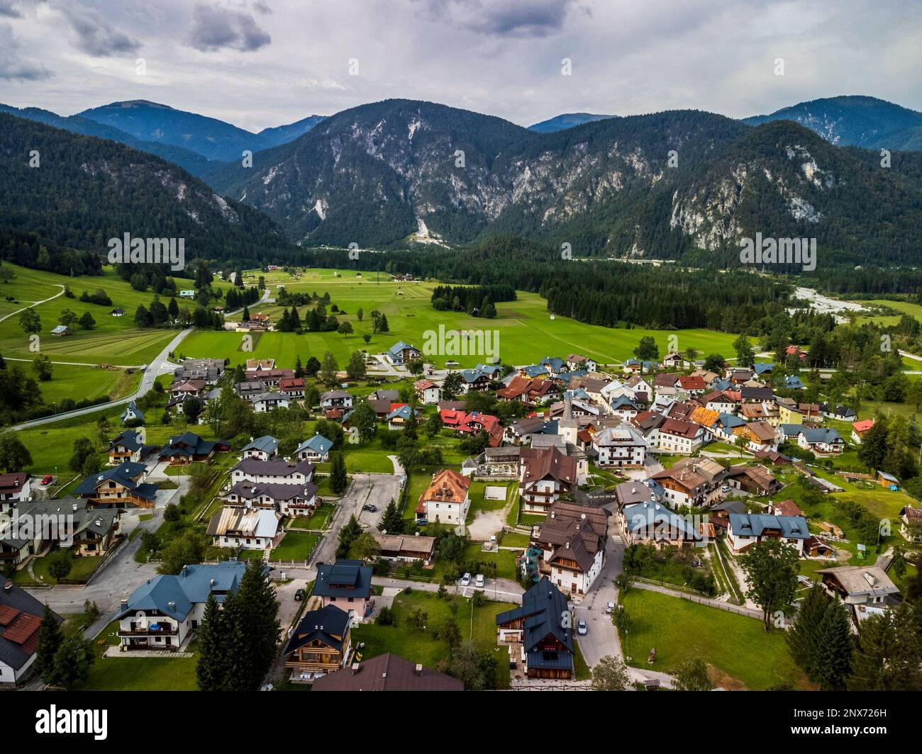 The mountain town of Valbruna and the Julian Alps. Dream nature. Friuli ...