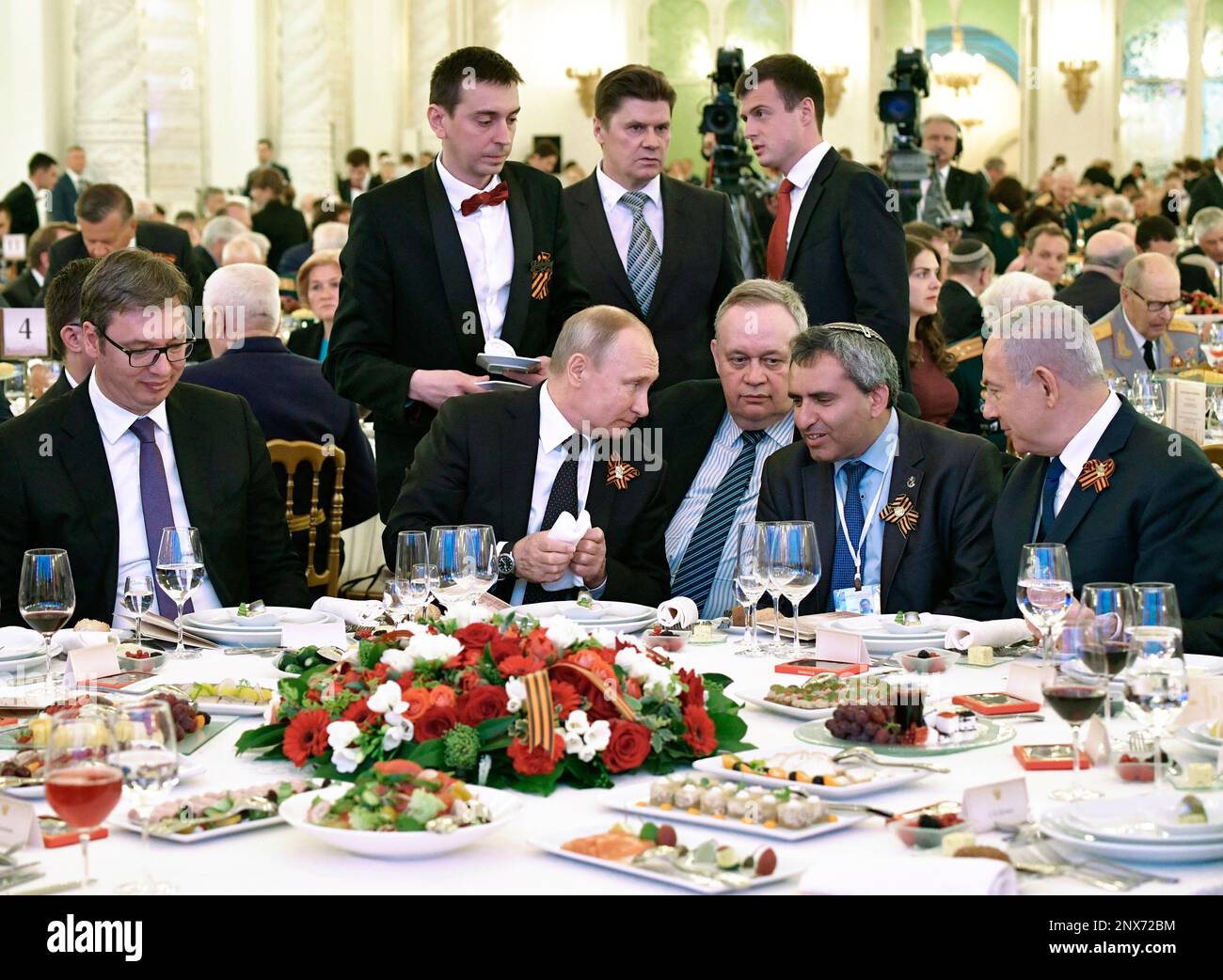 Russian President Vladimir Putin, second left, Serbian President ...