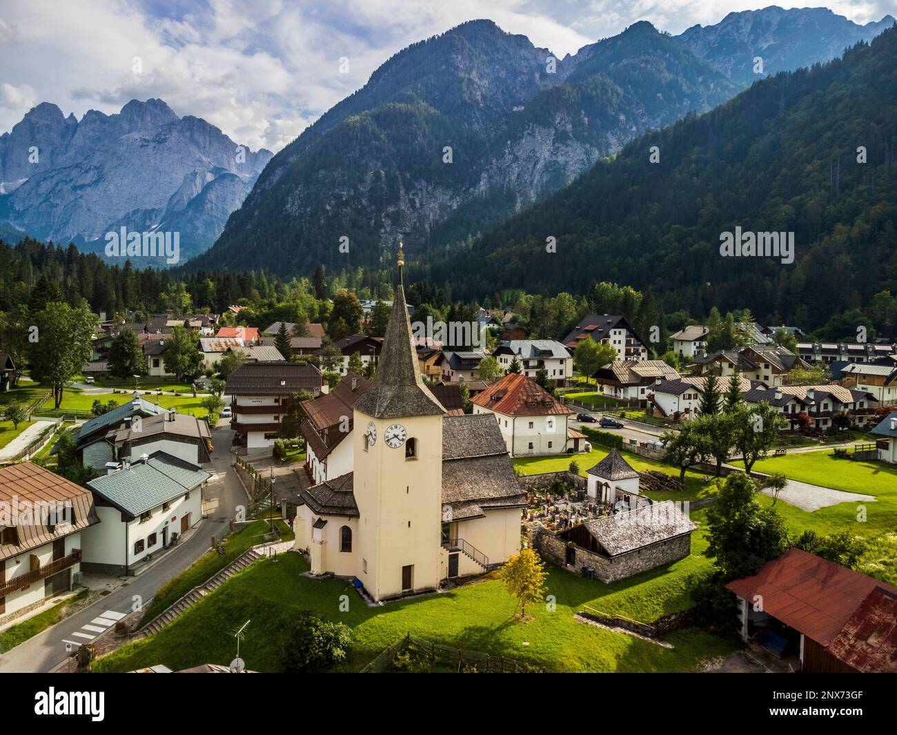 The mountain town of Valbruna and the Julian Alps. Dream nature. Friuli ...