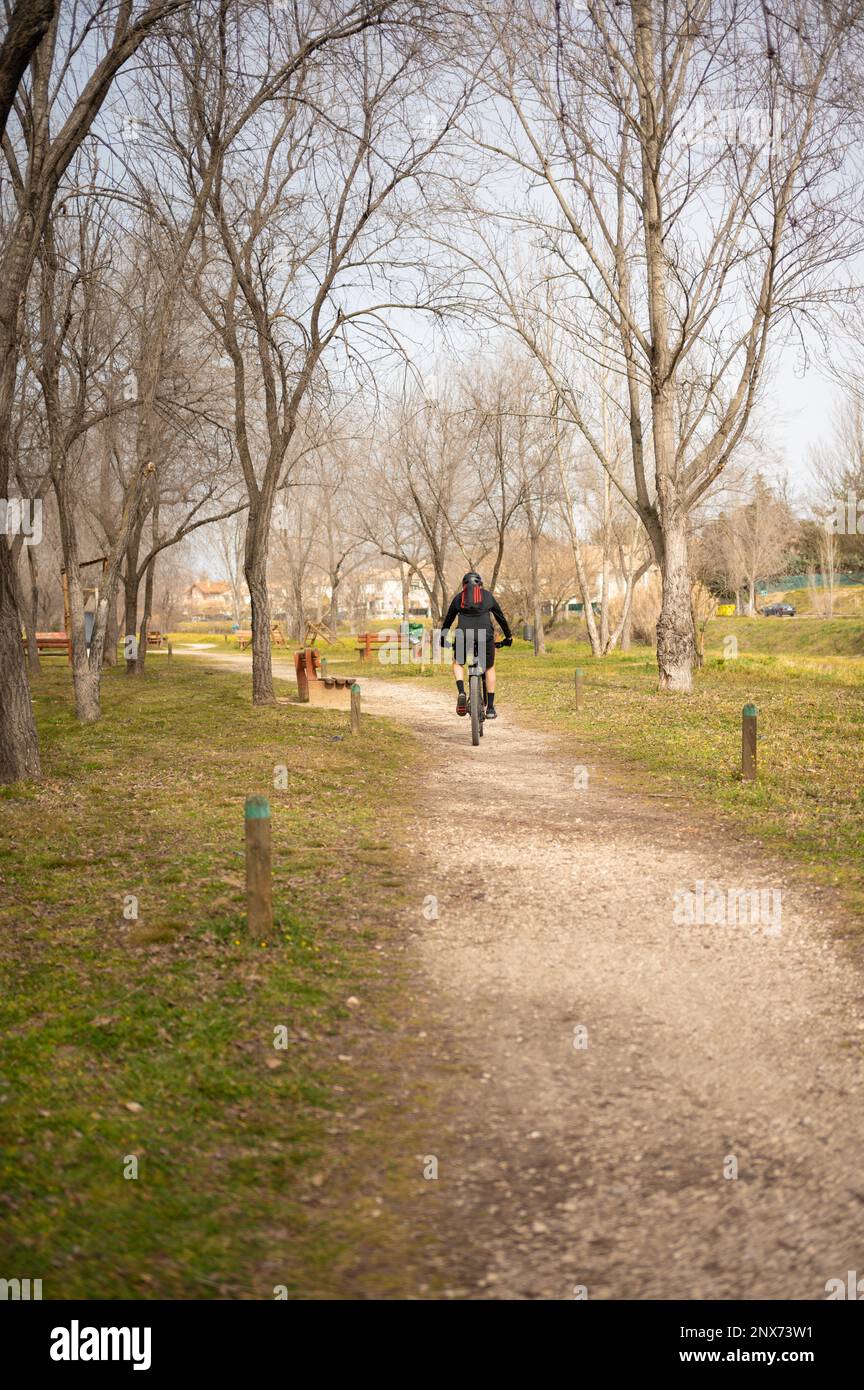 Riding Through the Countryside: A Man's Adventure on a Dirt Road Stock ...