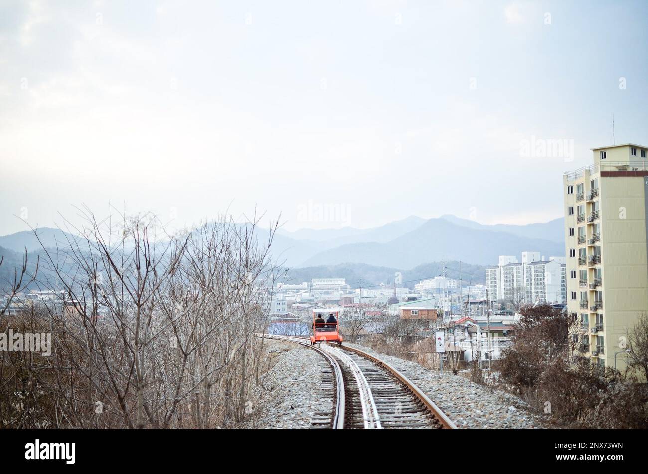 2 men riding rail bike at Gapyeong Rail Park, Nami Island Stock Photo - Alamy