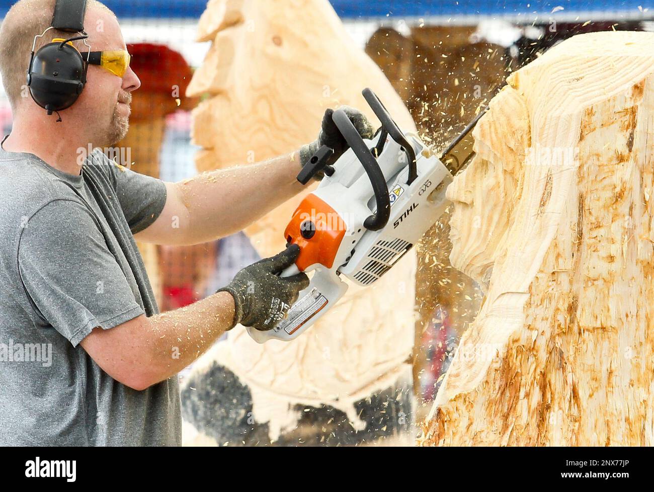 Douglas Ryan, of Altoona, PA, works on his carving of at the Sawing ...
