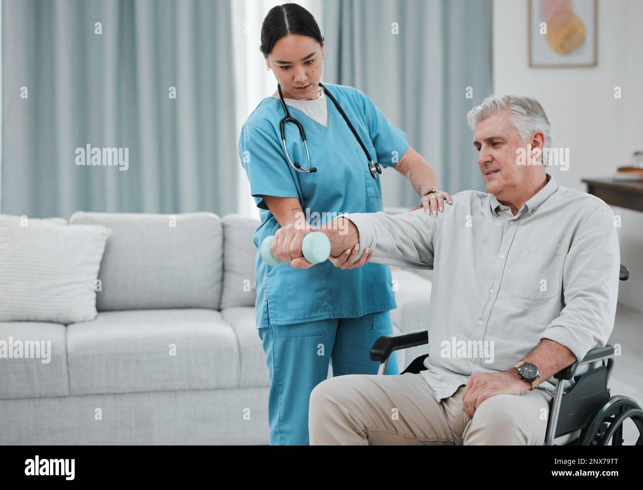 Disability, nurse or old man with dumbbell in wheelchair moving arm for ...