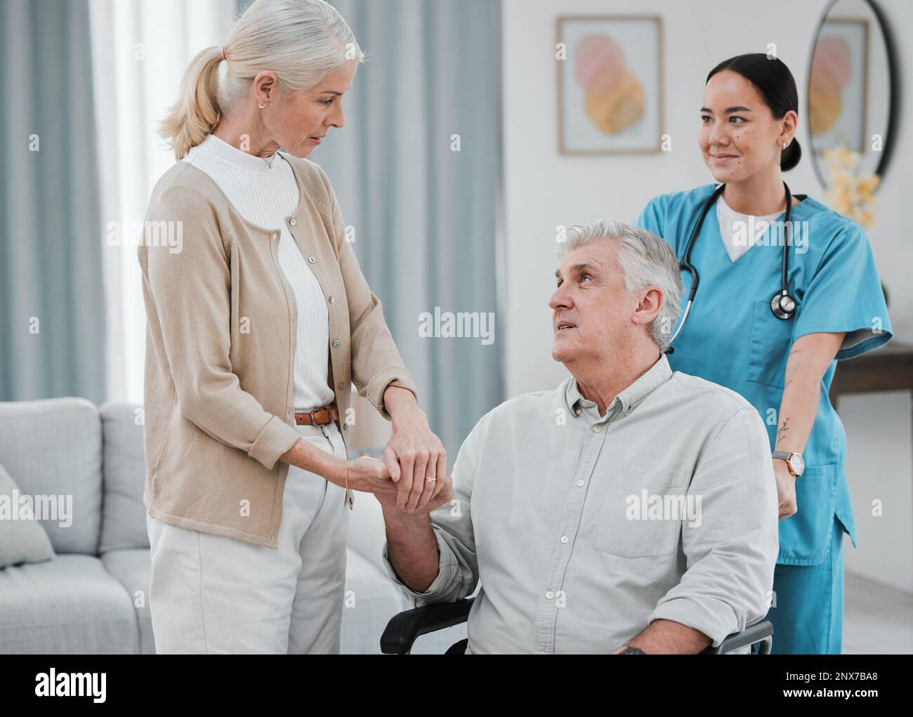 Disability, nurse or old couple holding hands in rehabilitation for ...