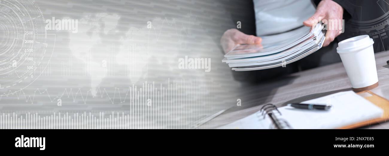 Male hands holding a stack of magazines; panoramic banner Stock Photo ...